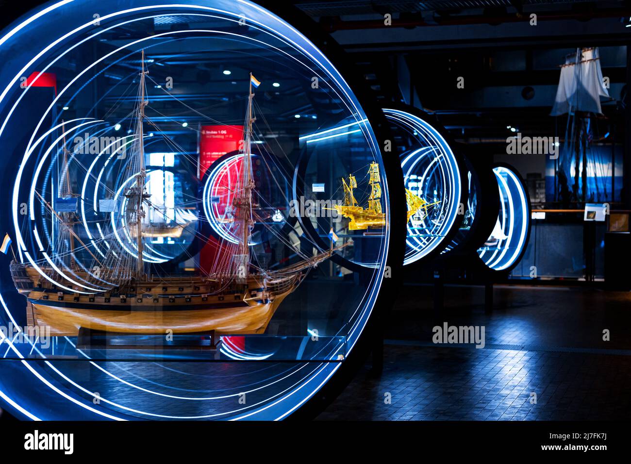 Art exhibition of ship models in glass circles in the museum Stock ...