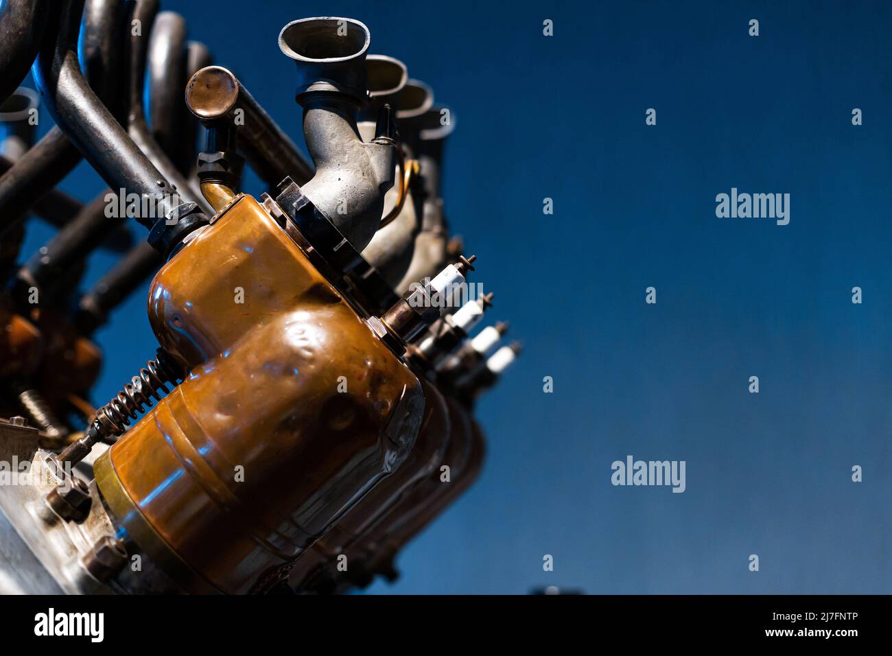 Close-up of a detail of a rare car engine. Metal mechanisms. Automotive ...