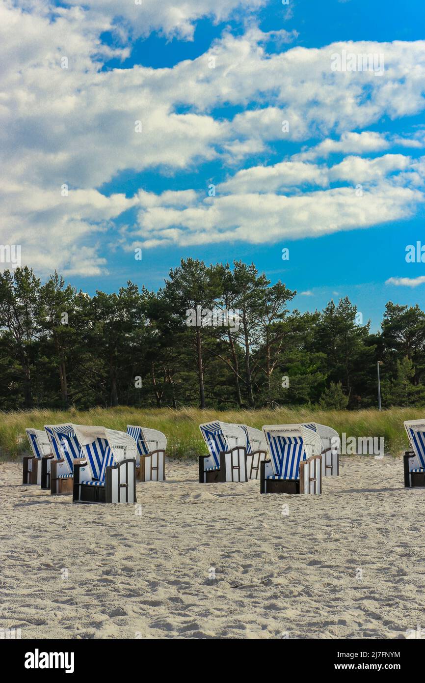 Sandy beach with traditional beach chairs at the Baltic Sea in Germany ...
