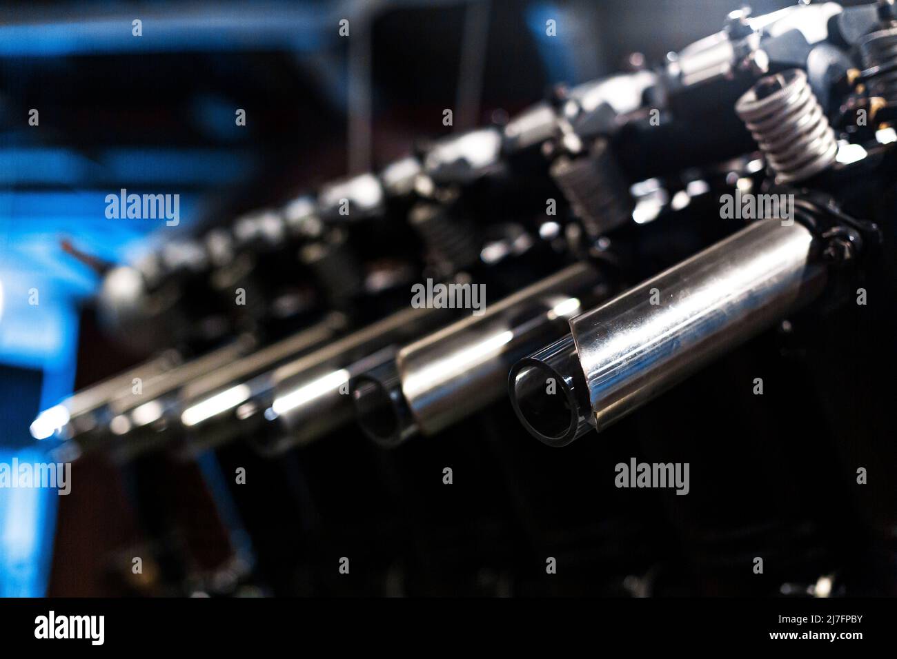 Close-up of a detail of a rare car engine. Metal mechanisms. Automotive ...