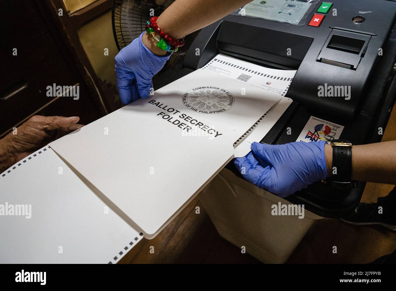 Manila, Philippines. 09th May, 2022. An election ballot seen being fed ...