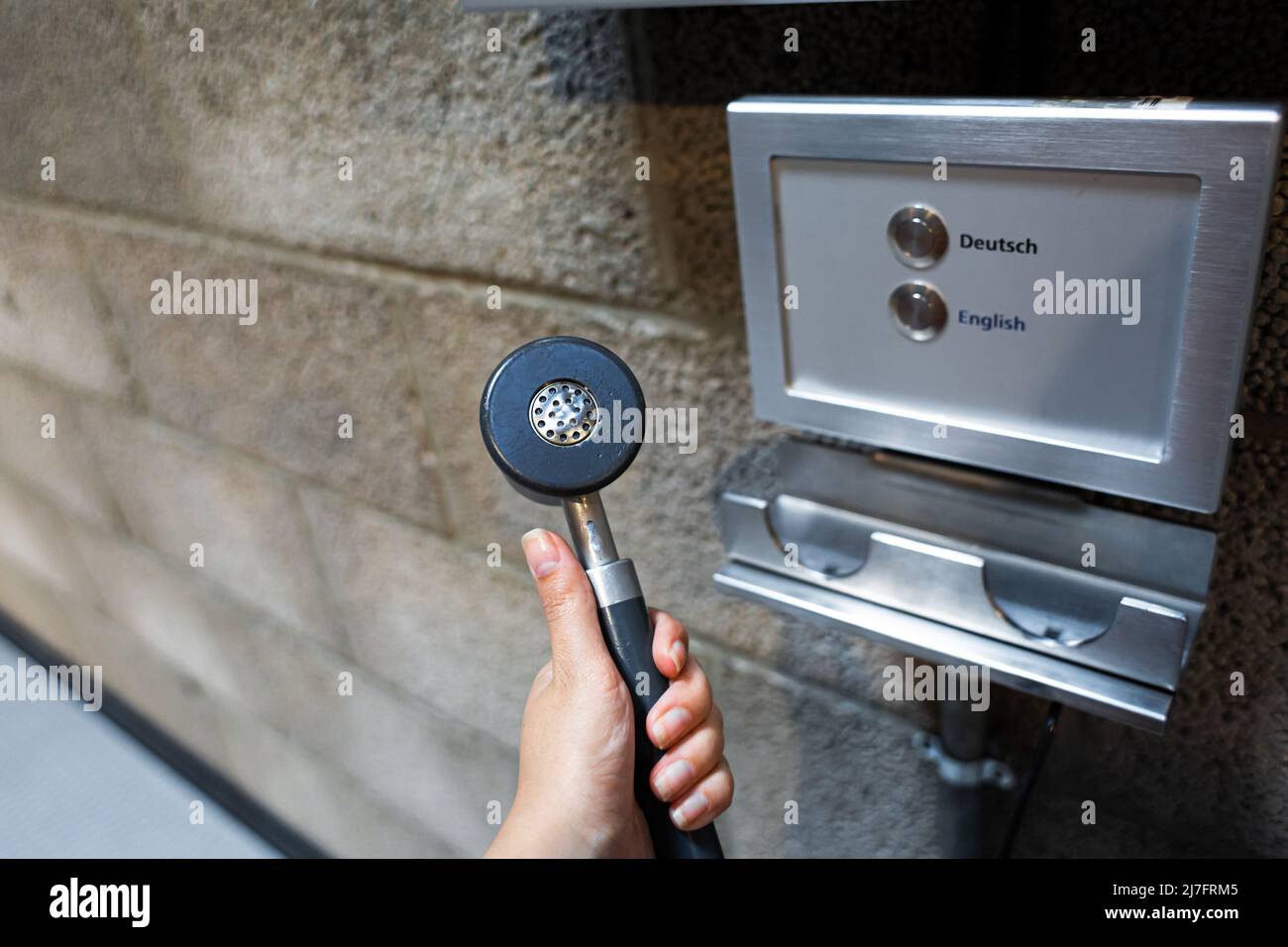 Audio guide device telling about the object in the selected language ...
