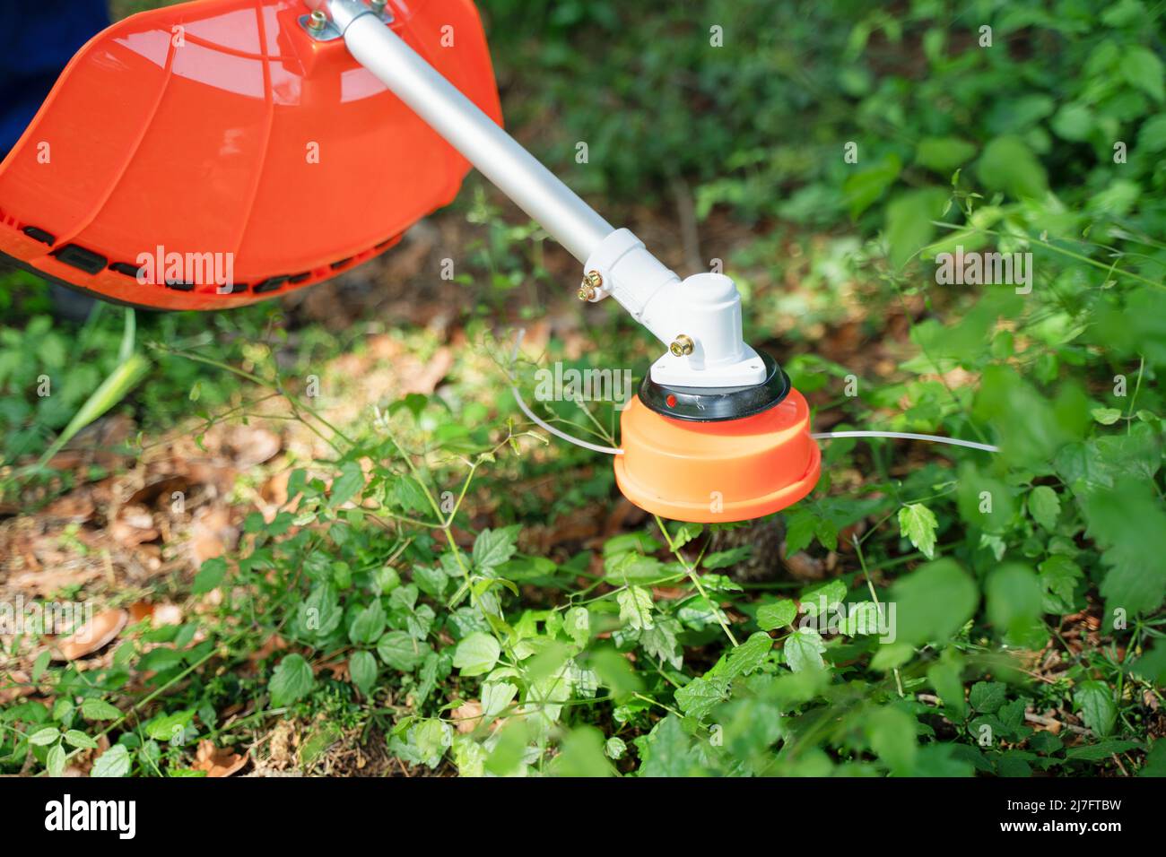 Manual grass cutter hi-res stock photography and images - Alamy