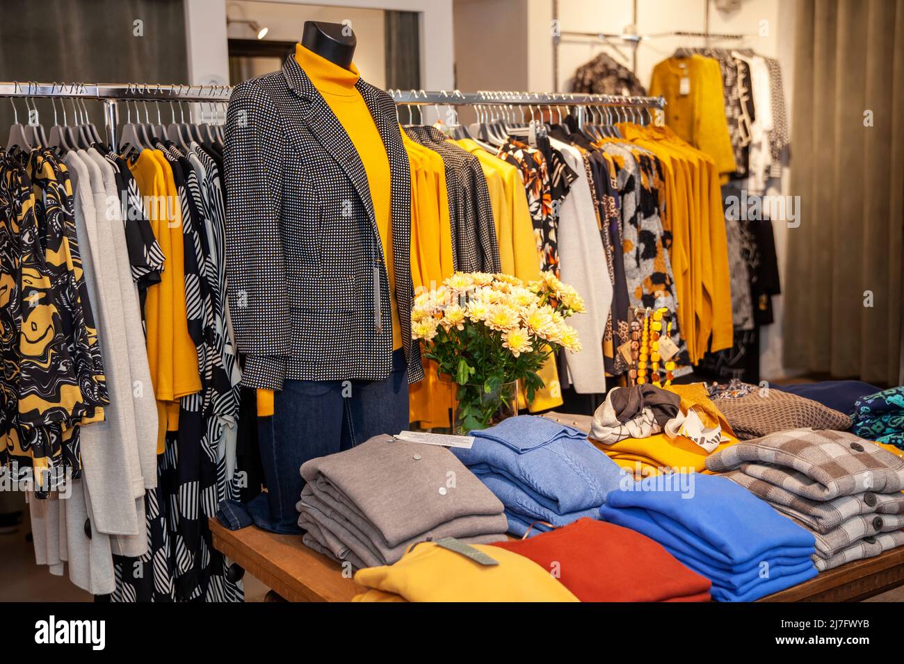 Interior of clothes shop Stock Photo - Alamy