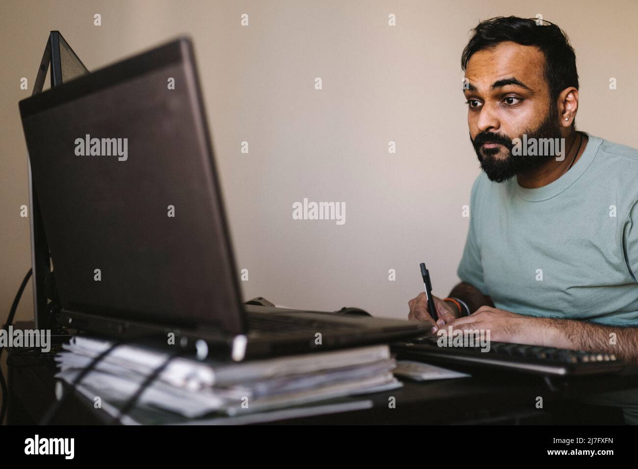 Man working from home Stock Photo - Alamy