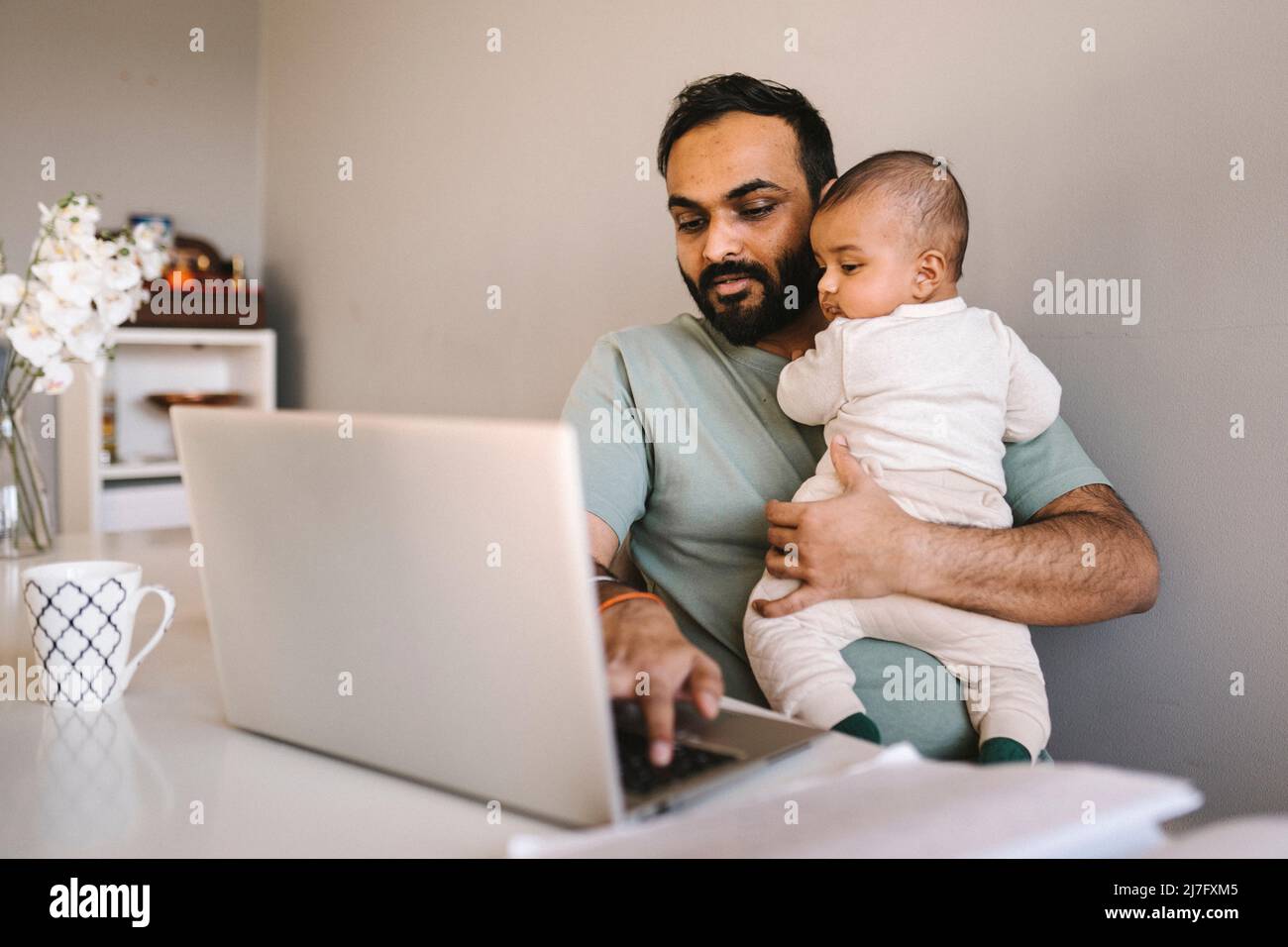 Father work home children computer hi-res stock photography and images ...
