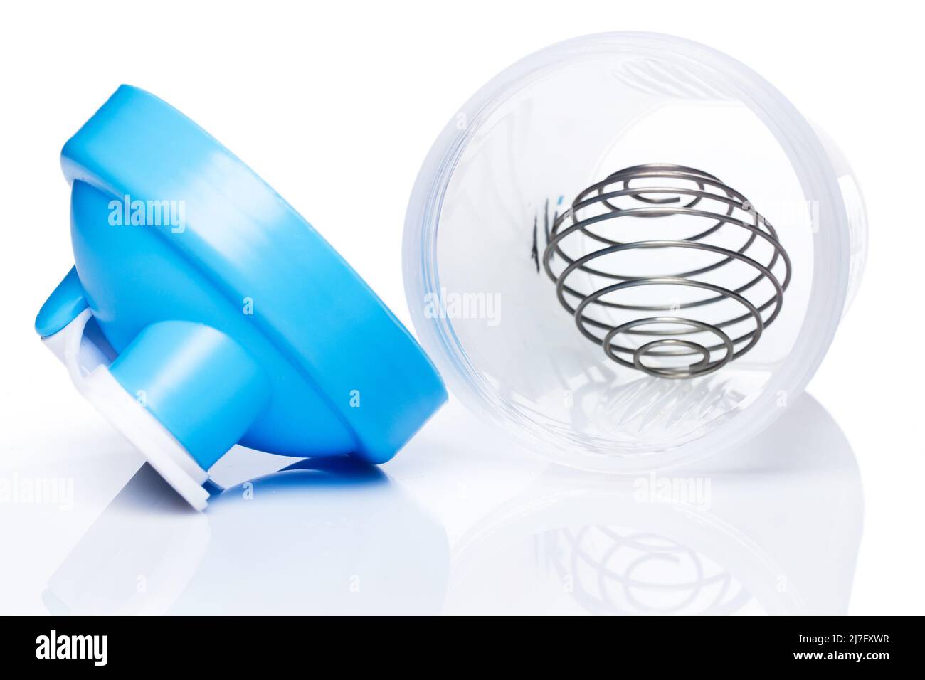 Protein shaker with metallic ball on white background Stock Photo - Alamy