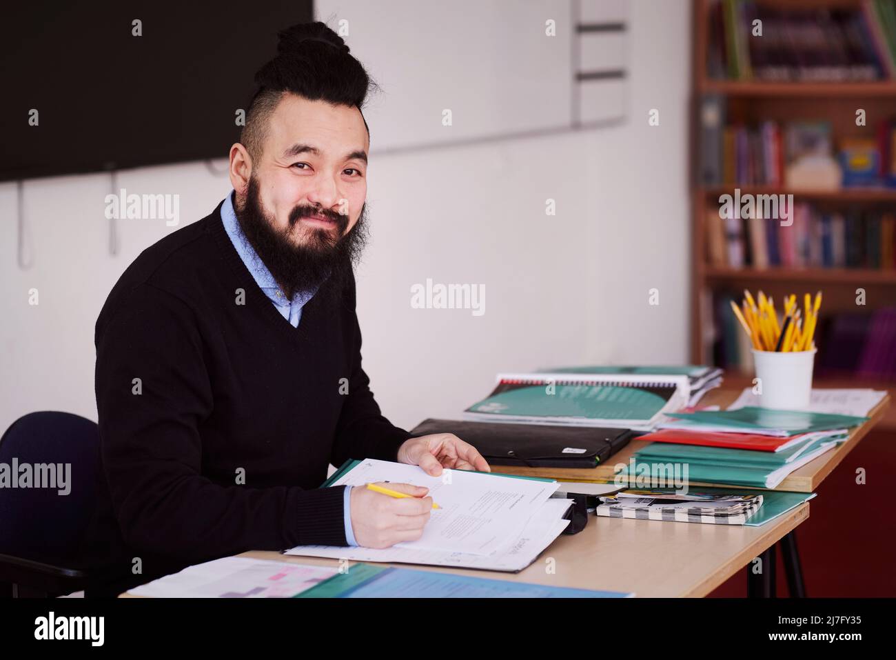 Smiling teacher hi-res stock photography and images - Alamy