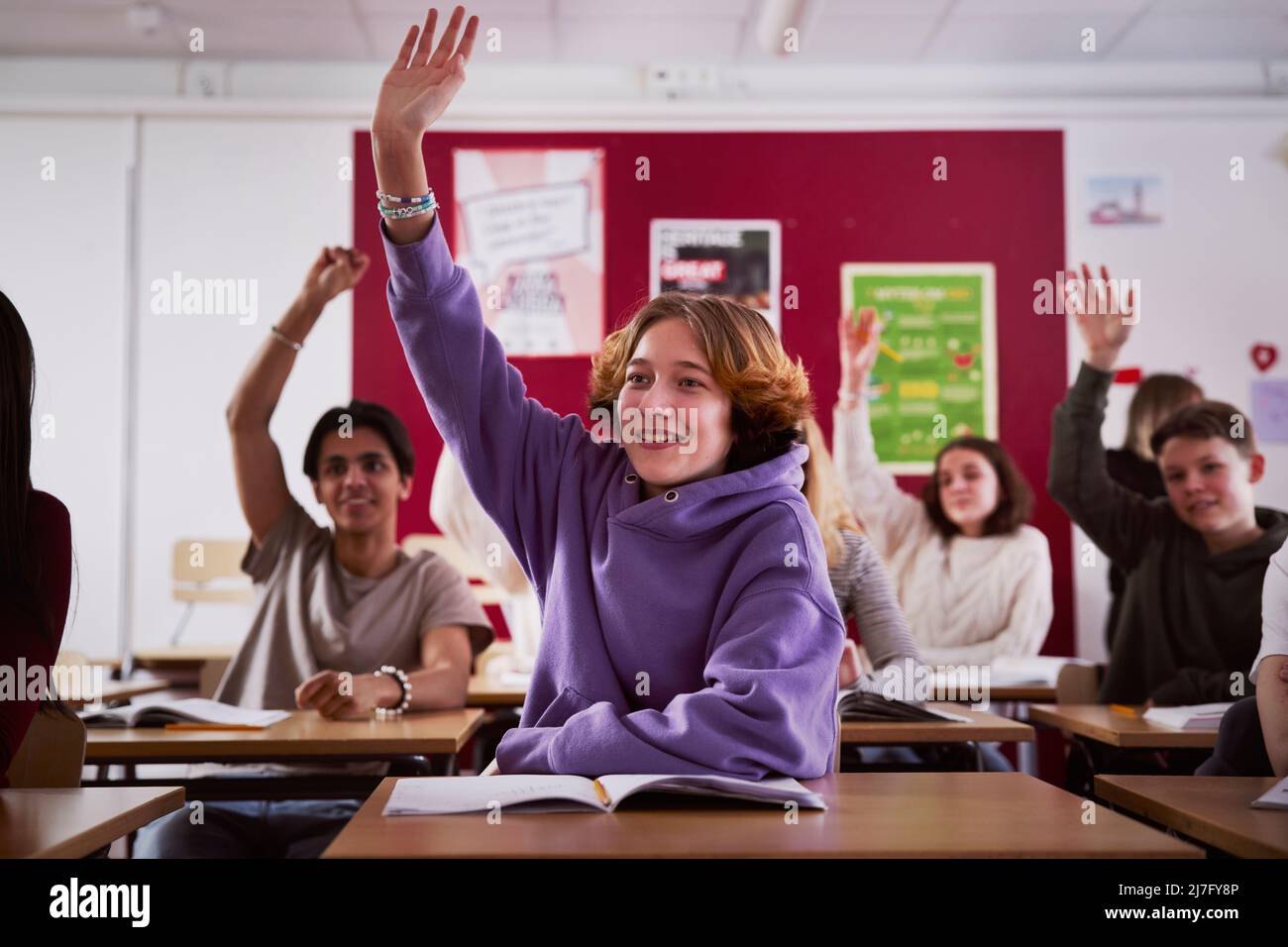 Teenagers in classroom Stock Photo - Alamy