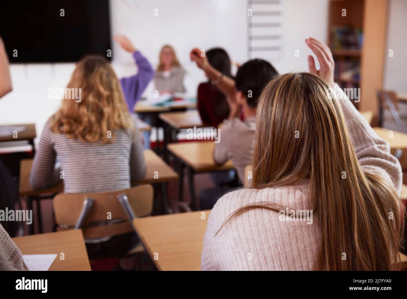Teenagers in classroom Stock Photo - Alamy