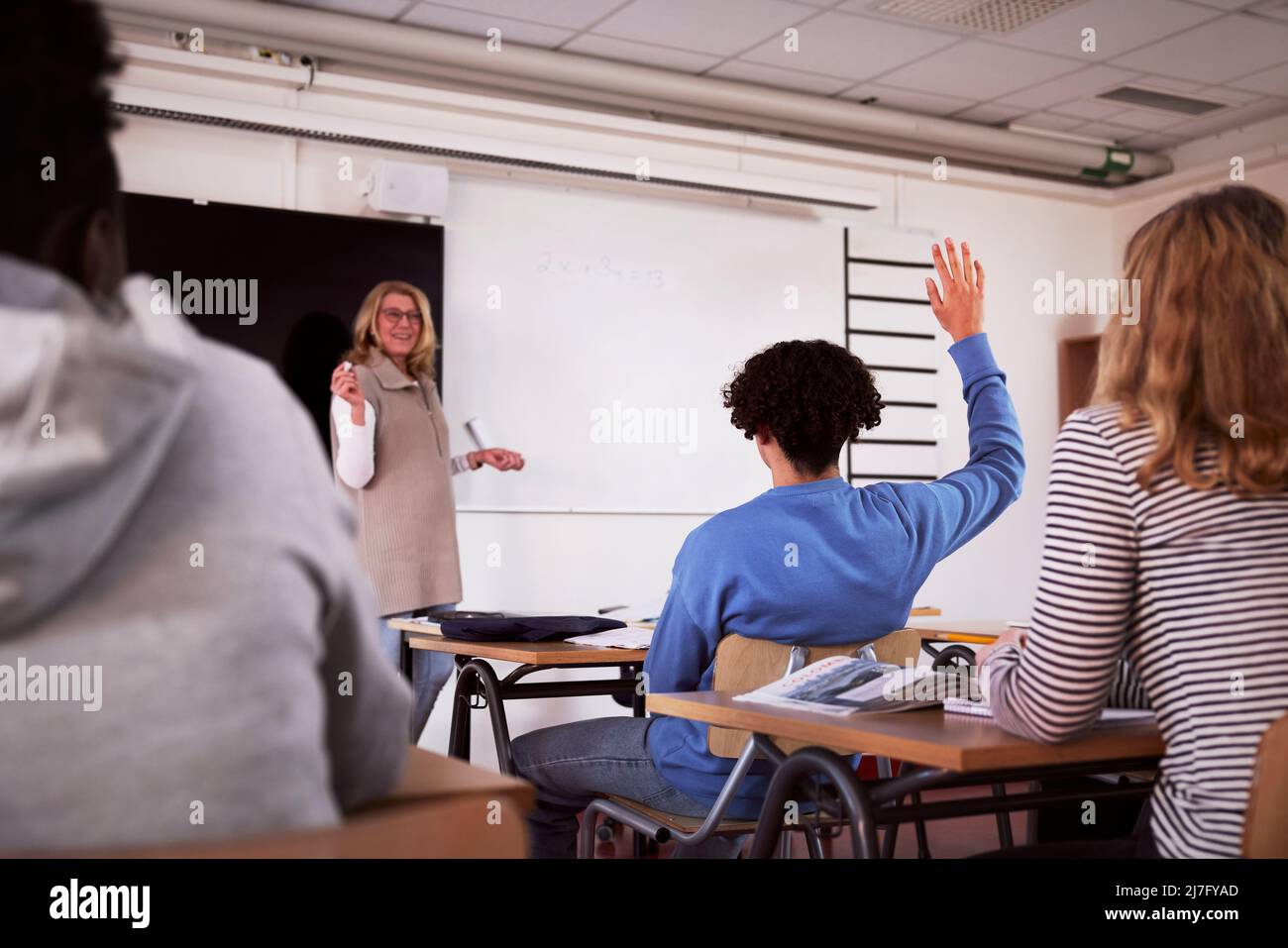 Three teenagers classroom hi-res stock photography and images - Alamy