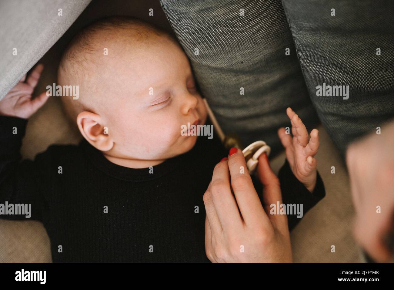 Newborn with pacifier hi-res stock photography and images - Alamy