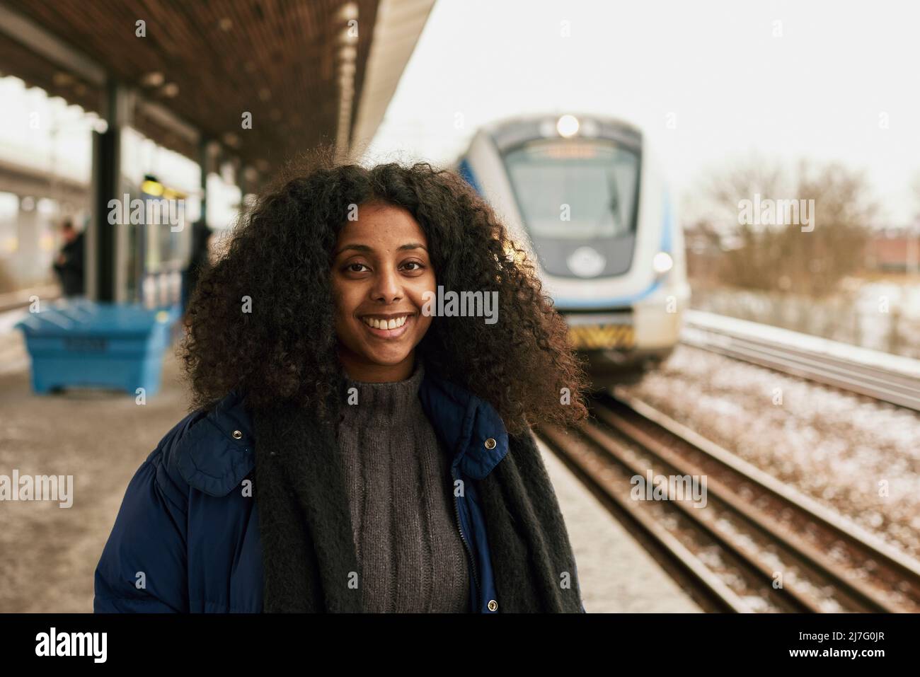 Woman train platform snow hi-res stock photography and images - Alamy