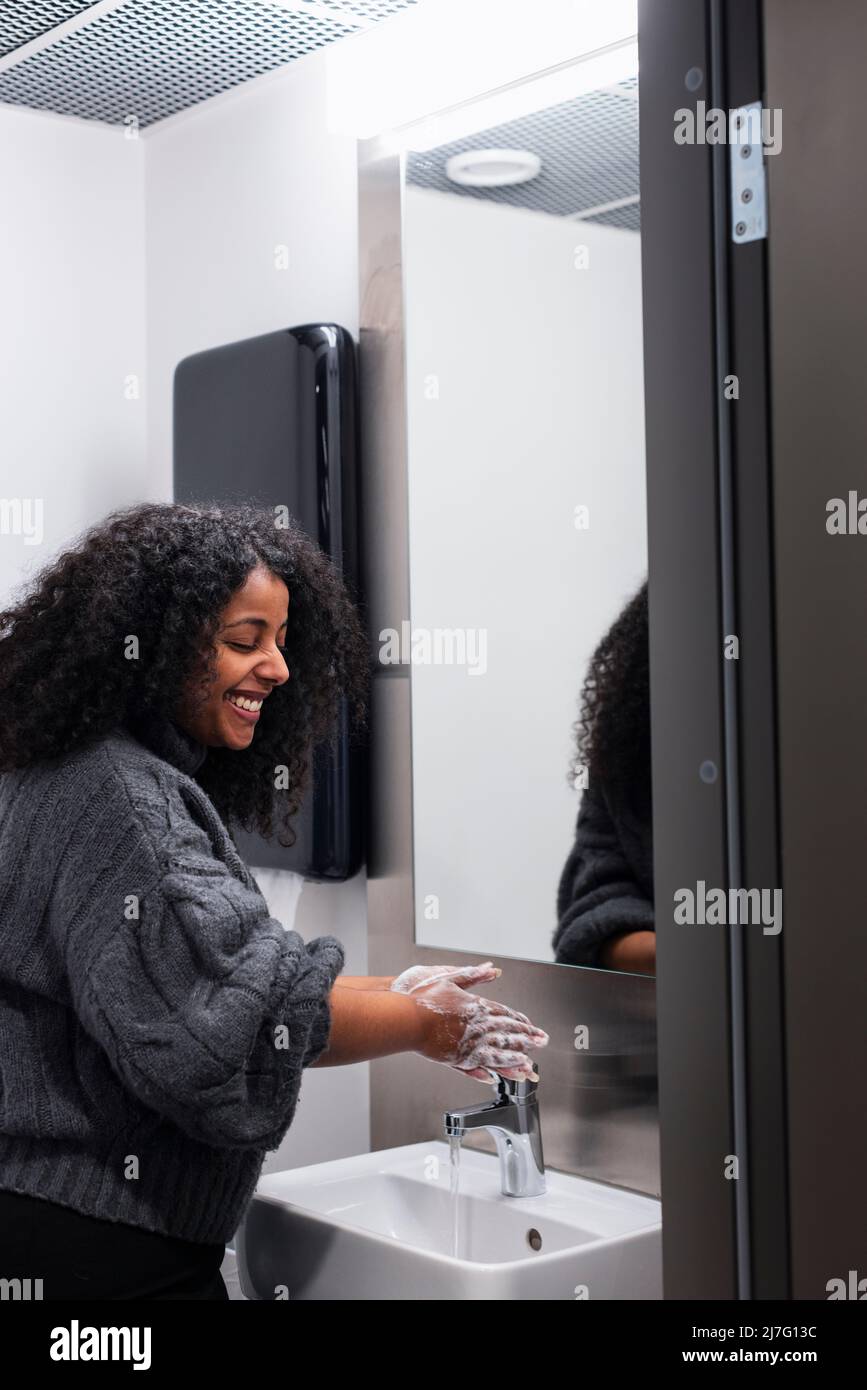 View of woman washing hands Stock Photo - Alamy