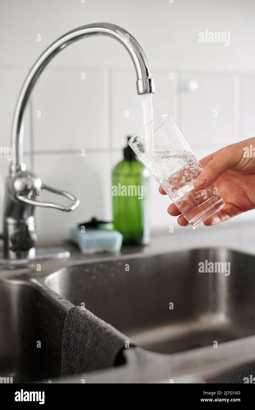Water pouring tap hi-res stock photography and images - Alamy