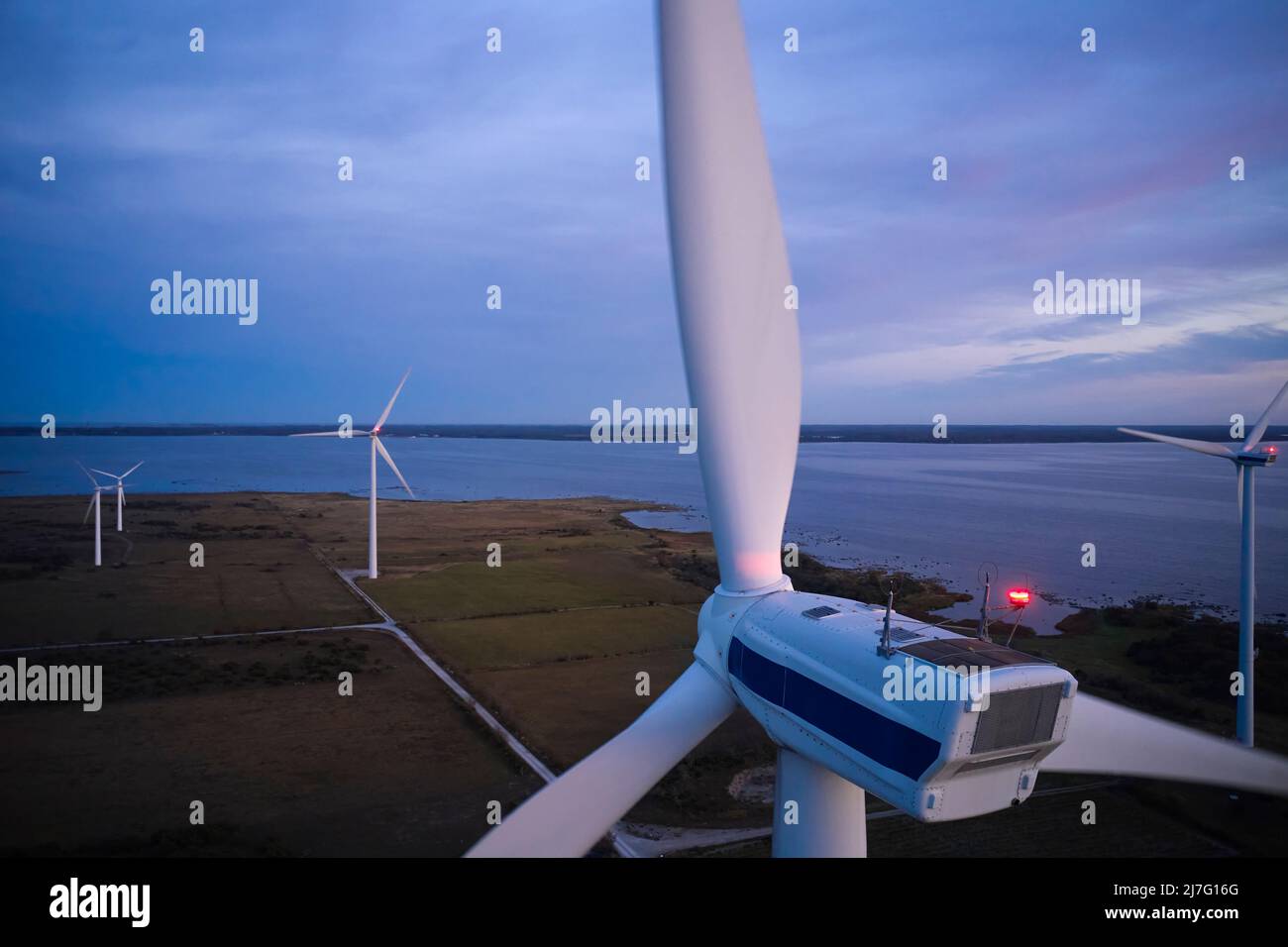 Wind turbines at lake Stock Photo - Alamy