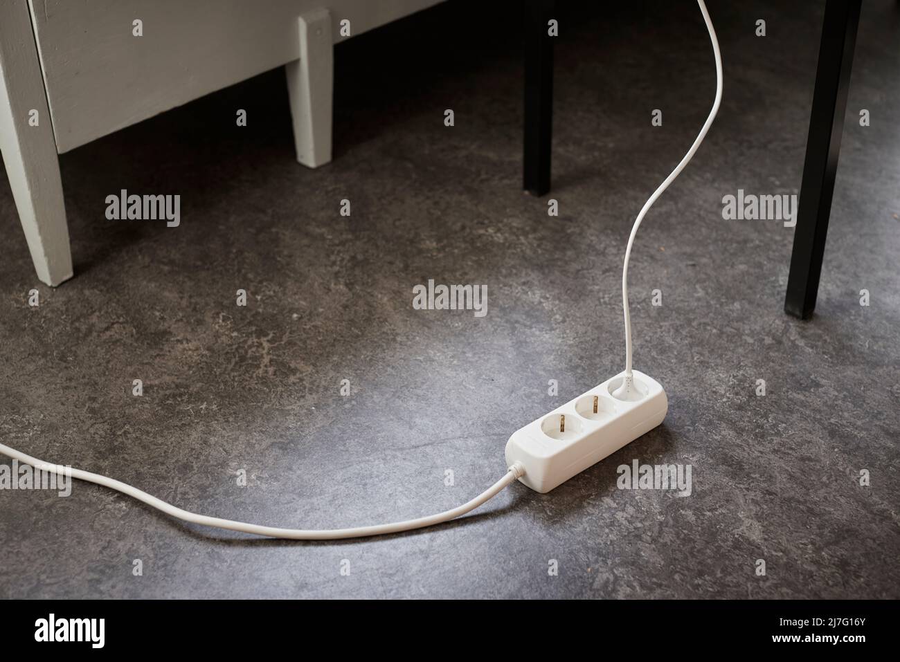 Electric extension with plug Stock Photo - Alamy