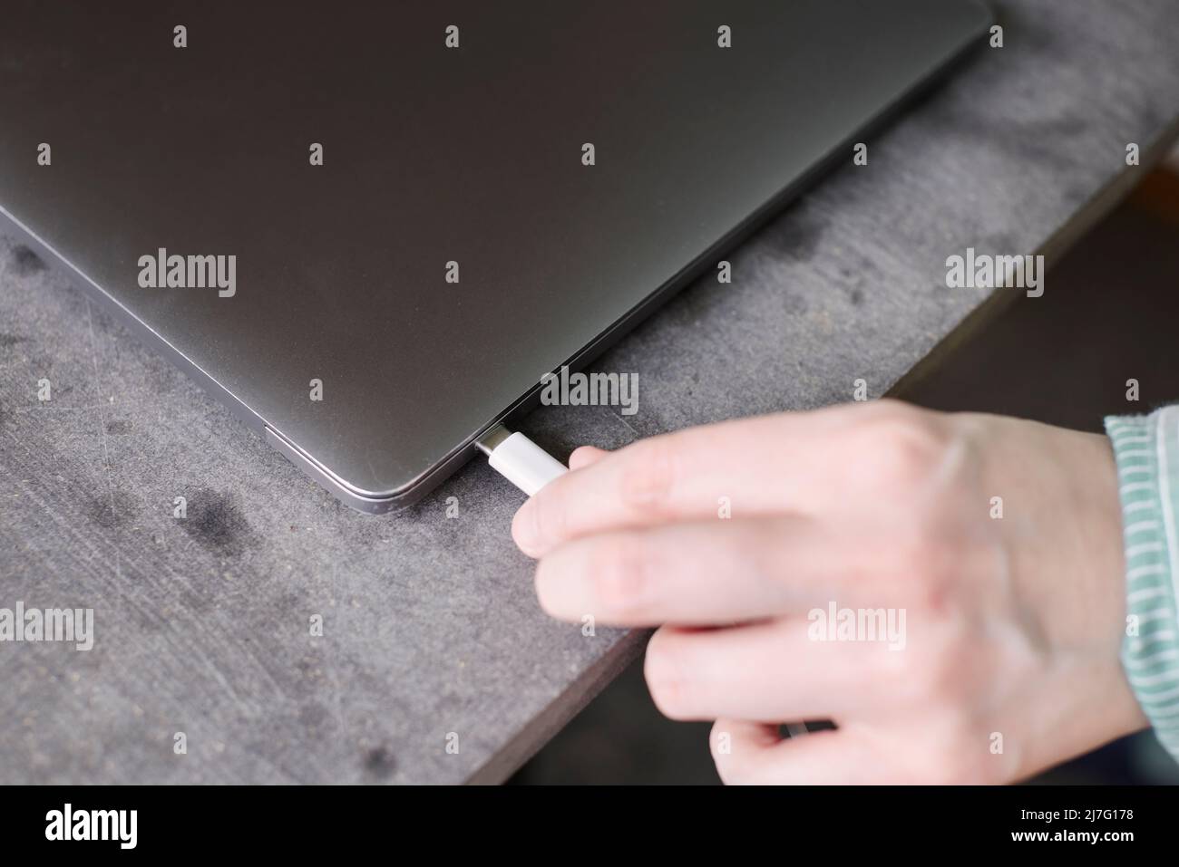 Close up hand plugging hi-res stock photography and images - Alamy