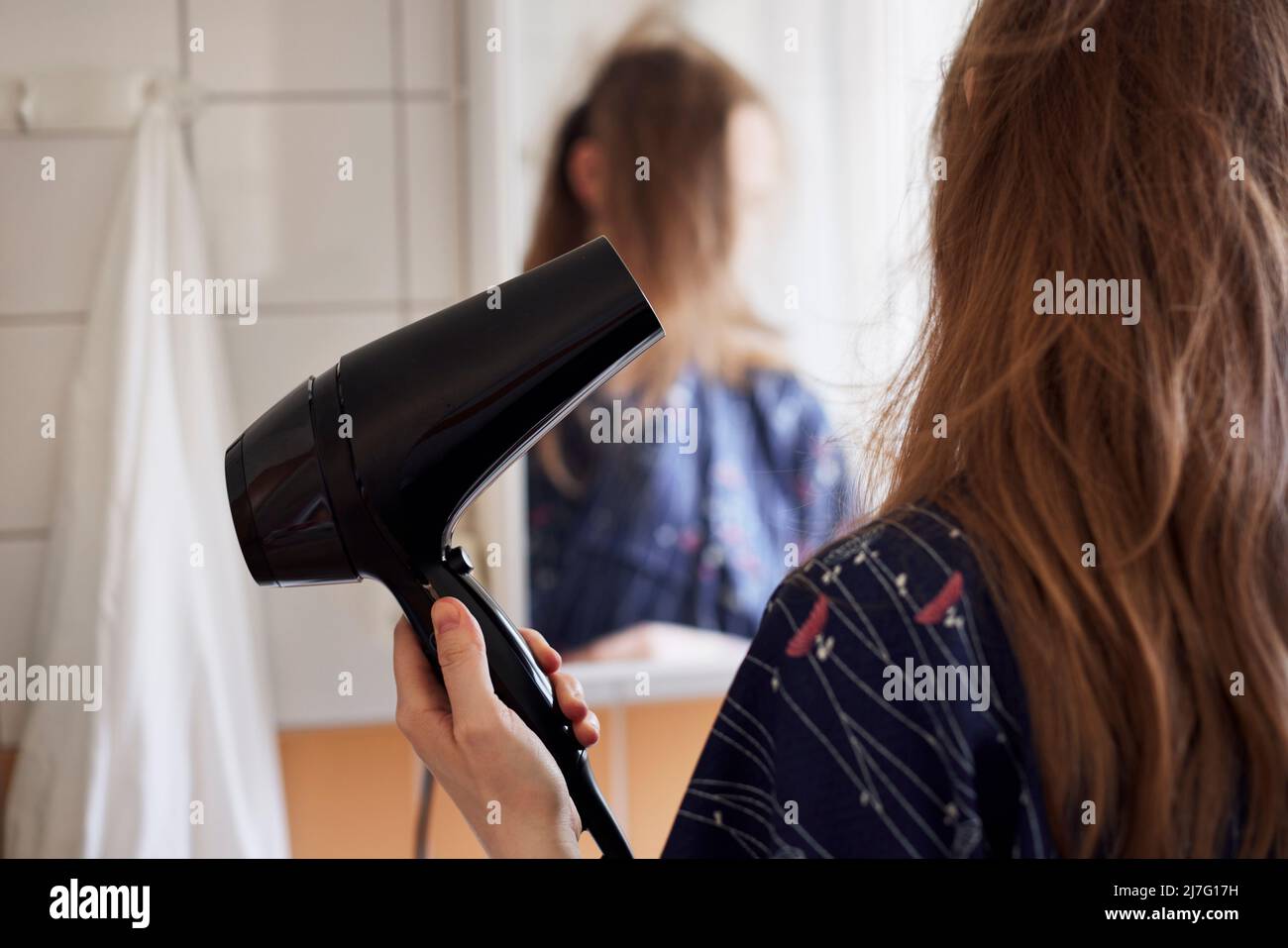 Hand hair dryer hi-res stock photography and images - Alamy