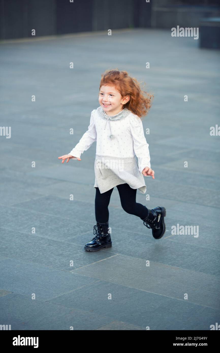 3 girls running hi-res stock photography and images - Alamy