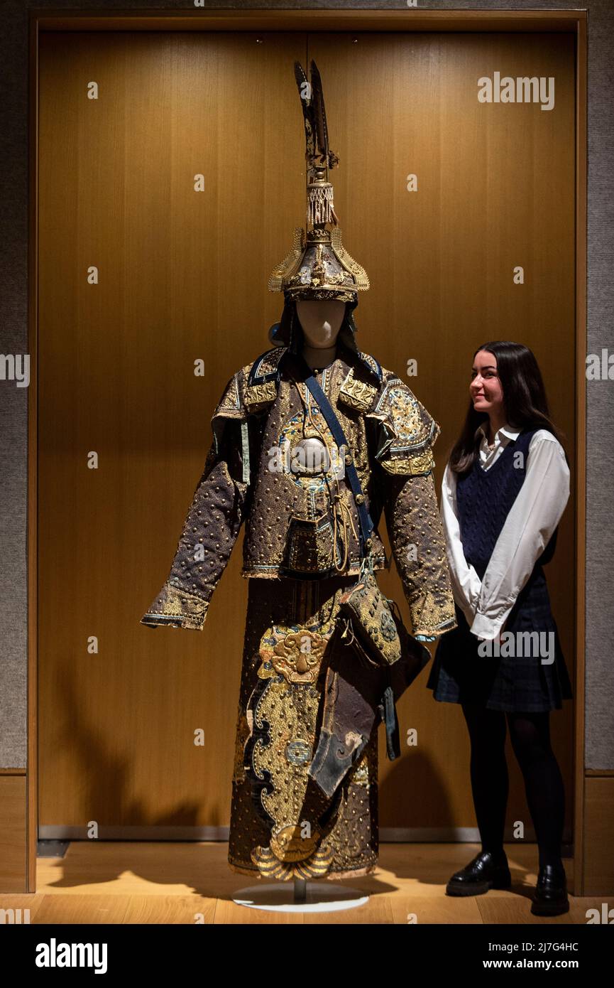 London, UK. 9 May 2022. A staff member poses with “A Rare Suit Of ...