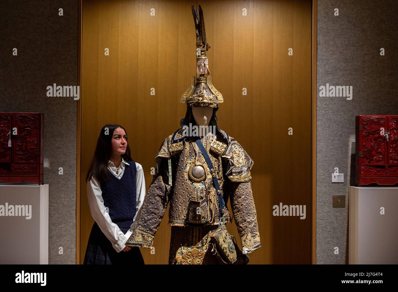 London, UK. 9 May 2022. A staff member poses with “A Rare Suit Of ...