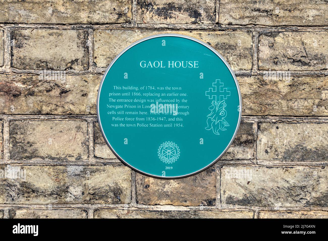 Green heritage plaque on the facade of Old Gaol House housing Stories ...