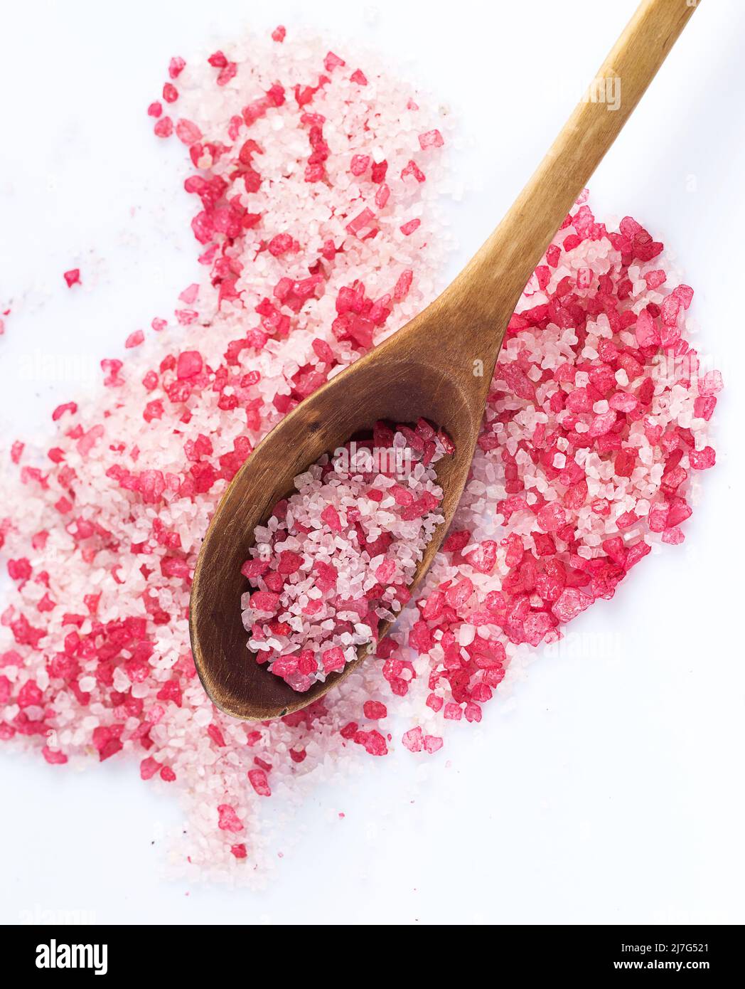 Wooden scoop with red sea salt for spa treatment Stock Photo - Alamy