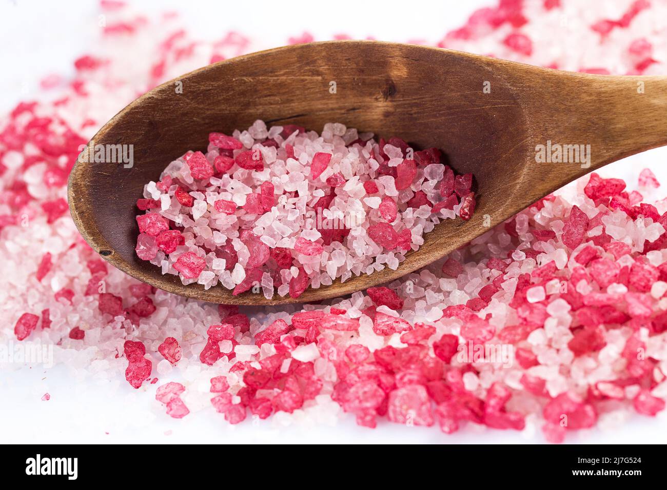 Wooden scoop with red sea salt for spa treatment Stock Photo - Alamy