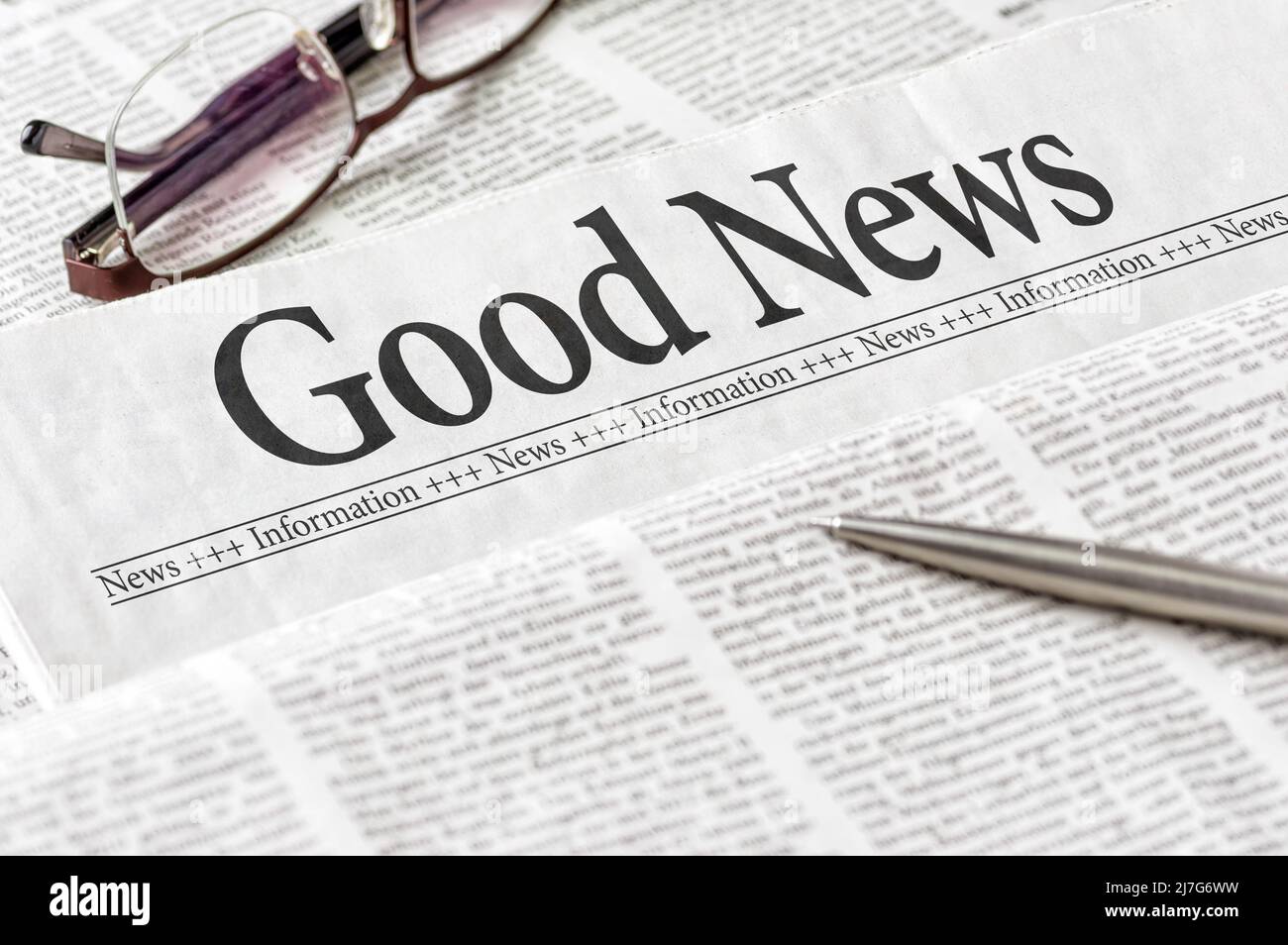 A newspaper with the headline Good news Stock Photo - Alamy