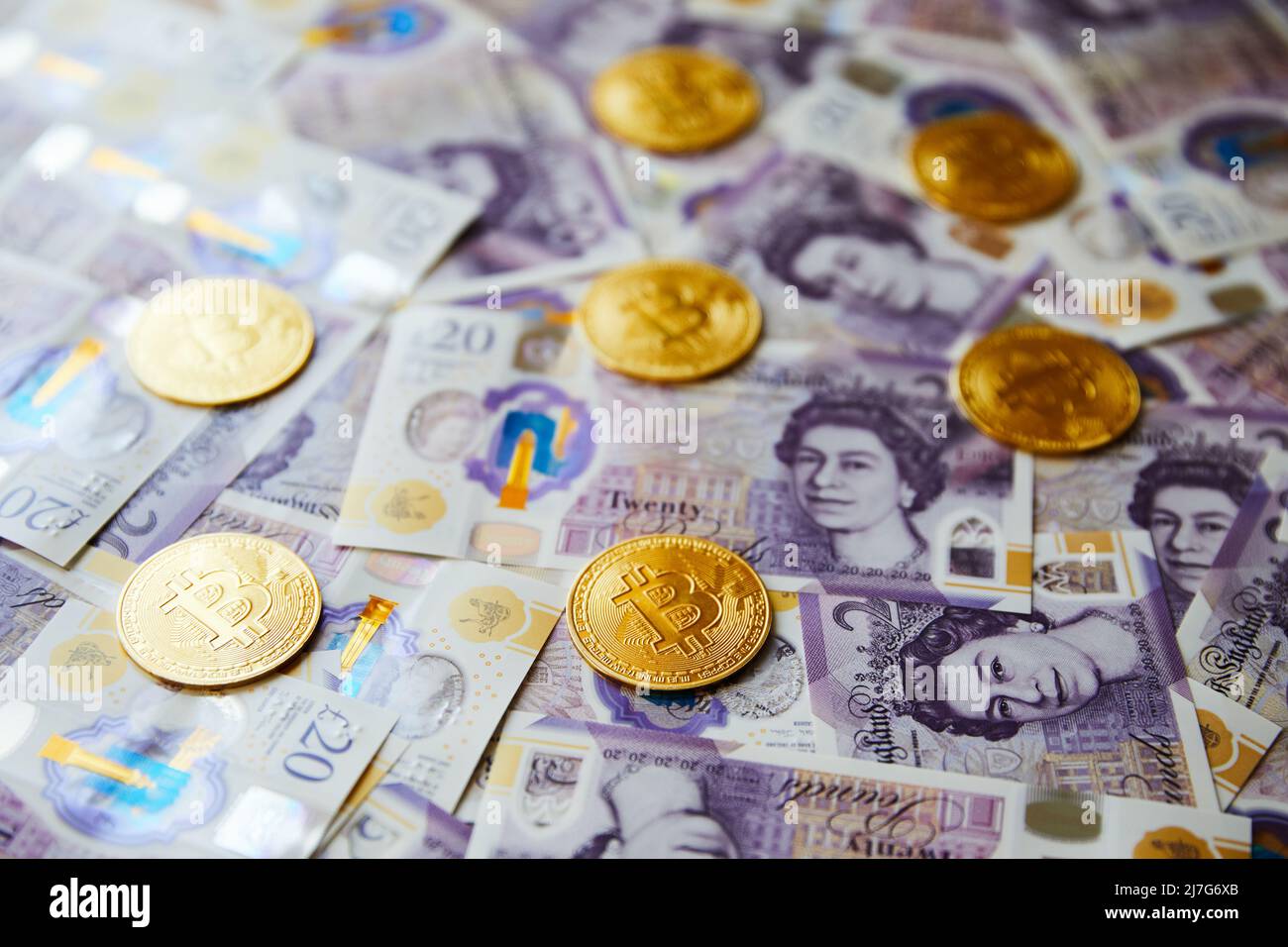 Bitcoin over british pound notes Stock Photo - Alamy