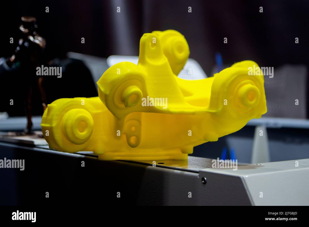 Yellow abstract 3D printed model. Objects printed on 3D printer from ...