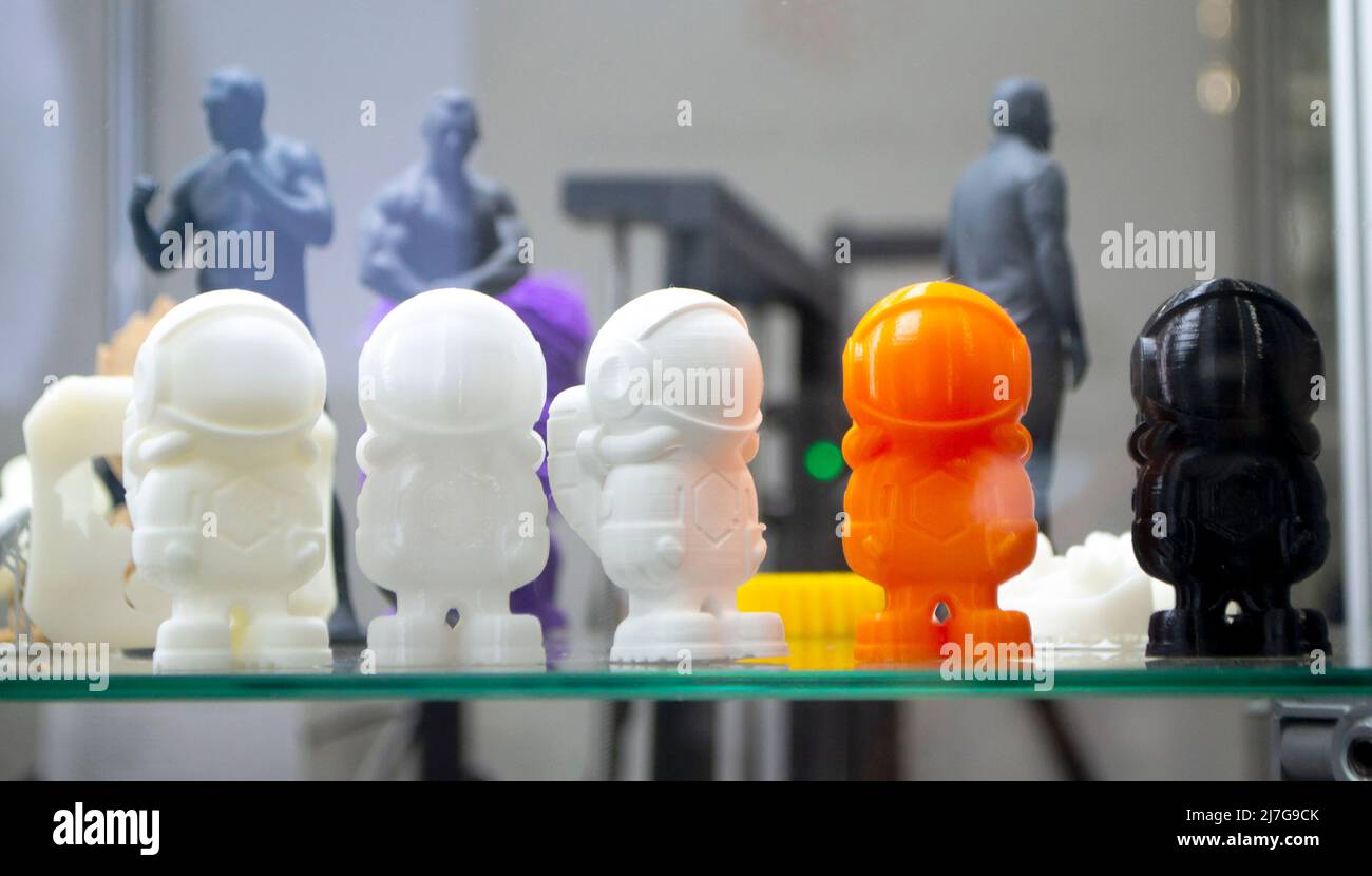 Multicolored 3D printed models. Objects printed on 3D printer from ...