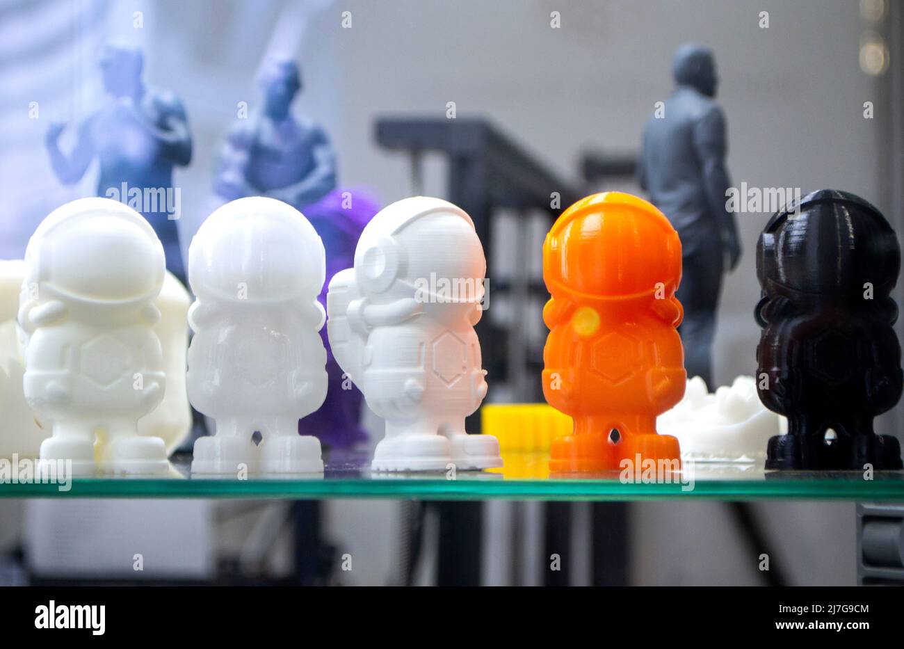 Multicolored 3D printed models. Objects printed on 3D printer from ...