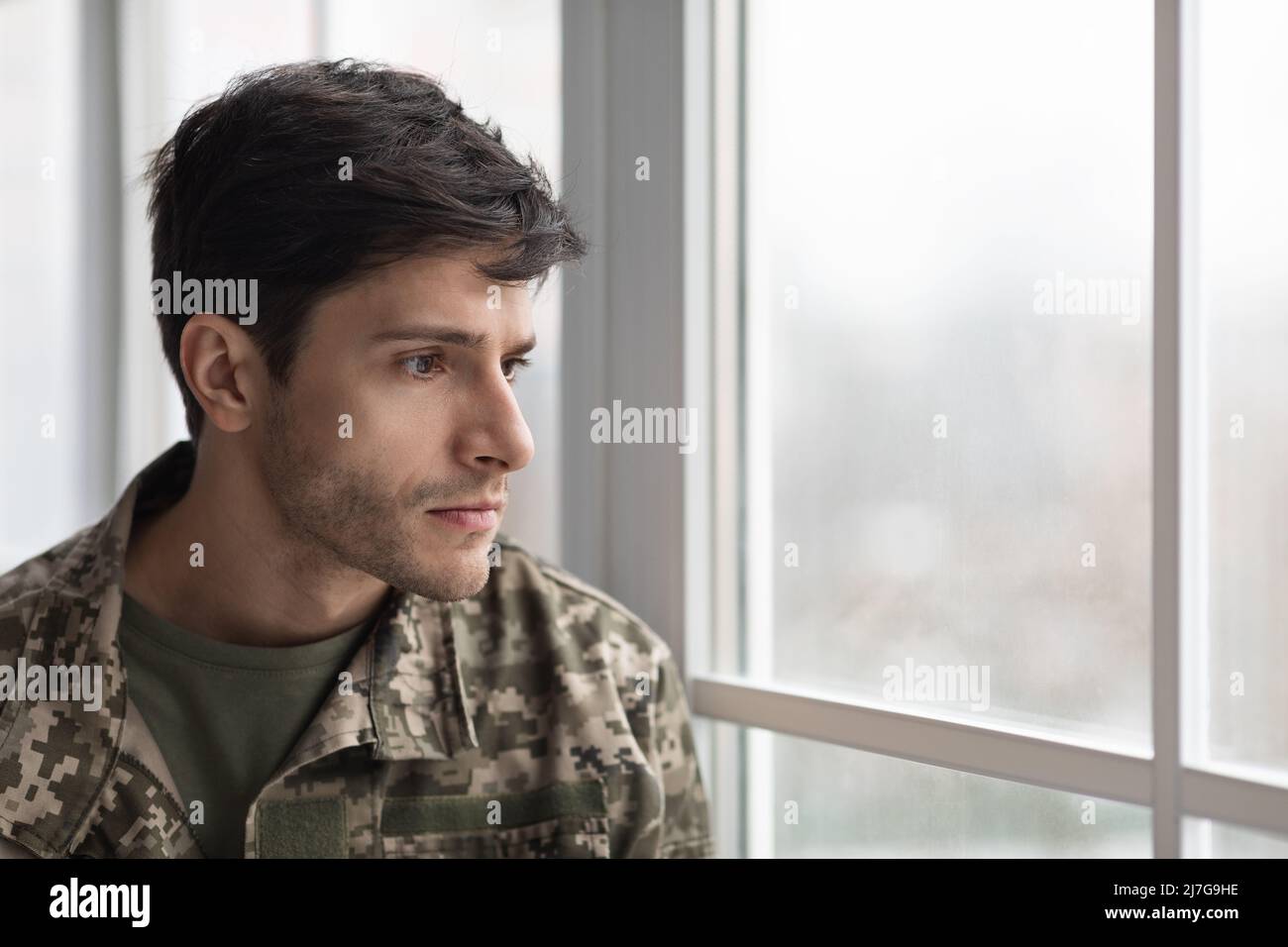 Soldier looking in window hi-res stock photography and images - Alamy