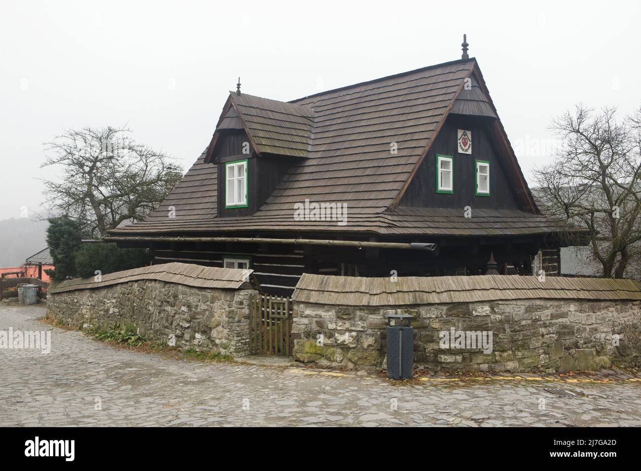Traditional wooden house (roubenka) in the picturesque town of ...