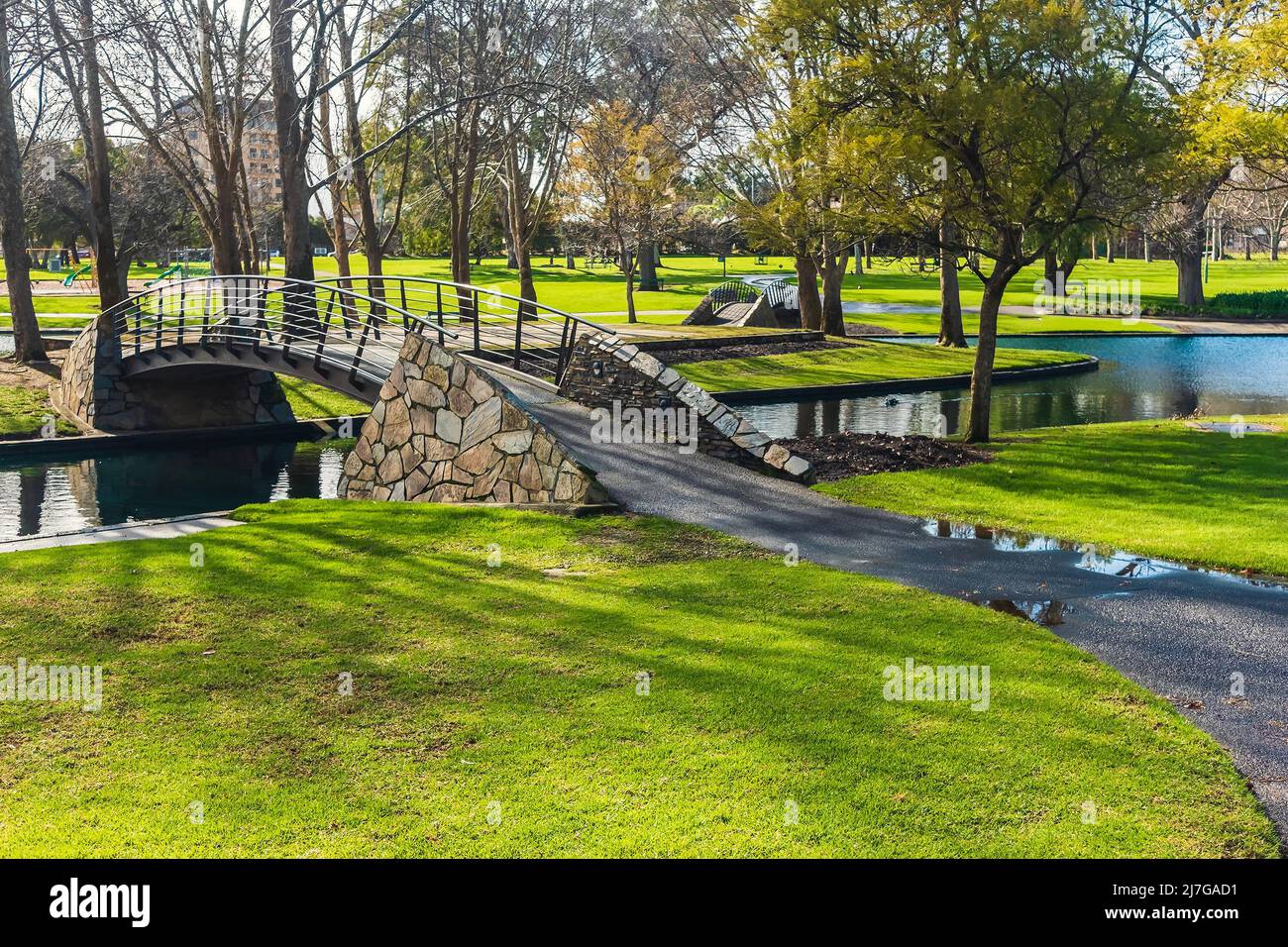 Historic Rymill Park bridge over the pond in Adelaide city on a sunny ...