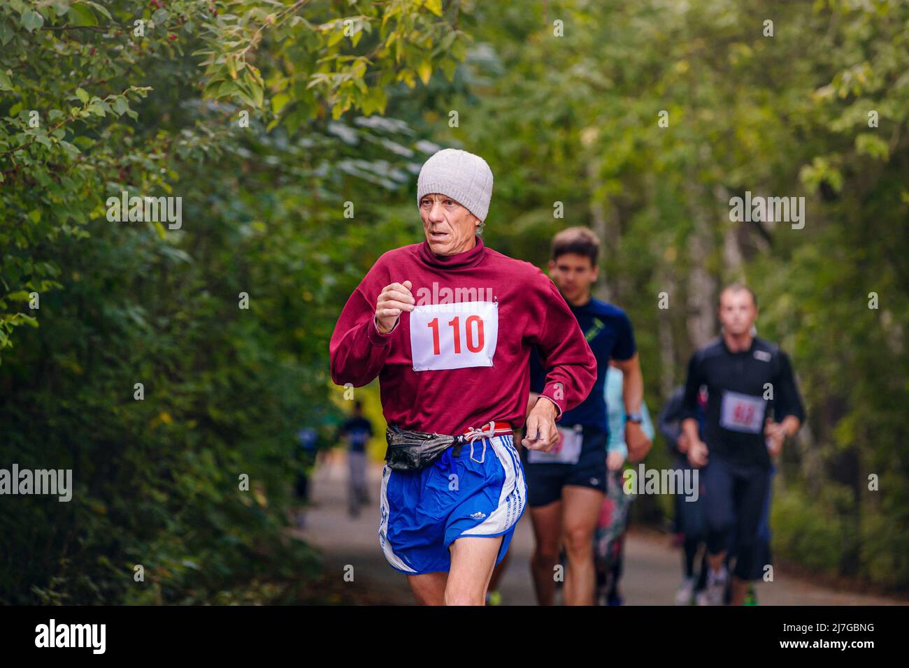 Senior men running race hi-res stock photography and images - Alamy