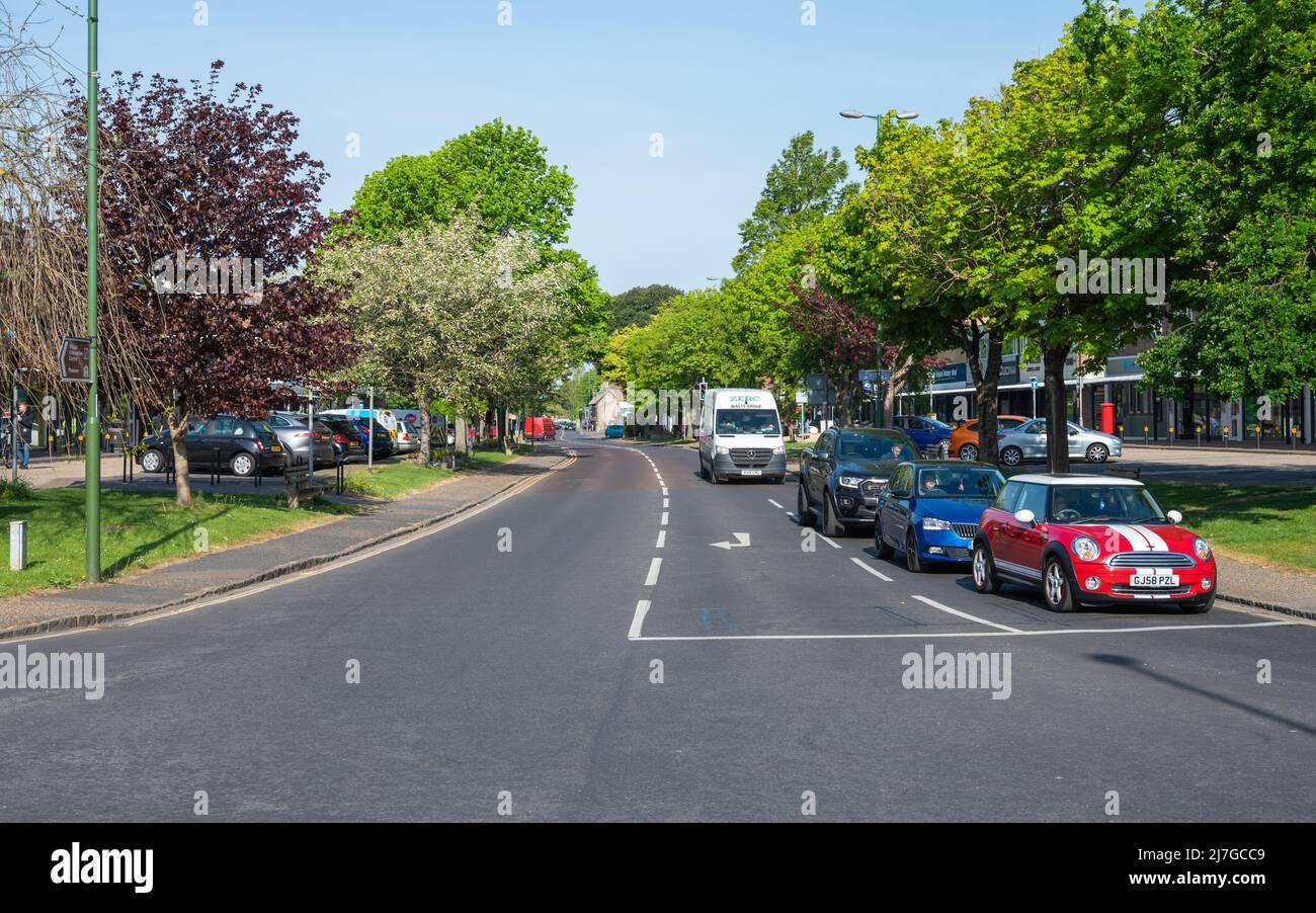 The main road and shops along The Street in the small British seaside ...