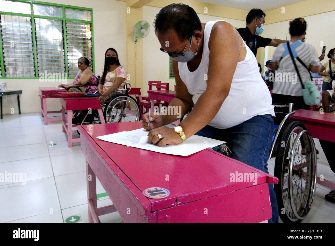 Philippines. 9th May, 2022. Person With Disabilities (PWD) while they ...
