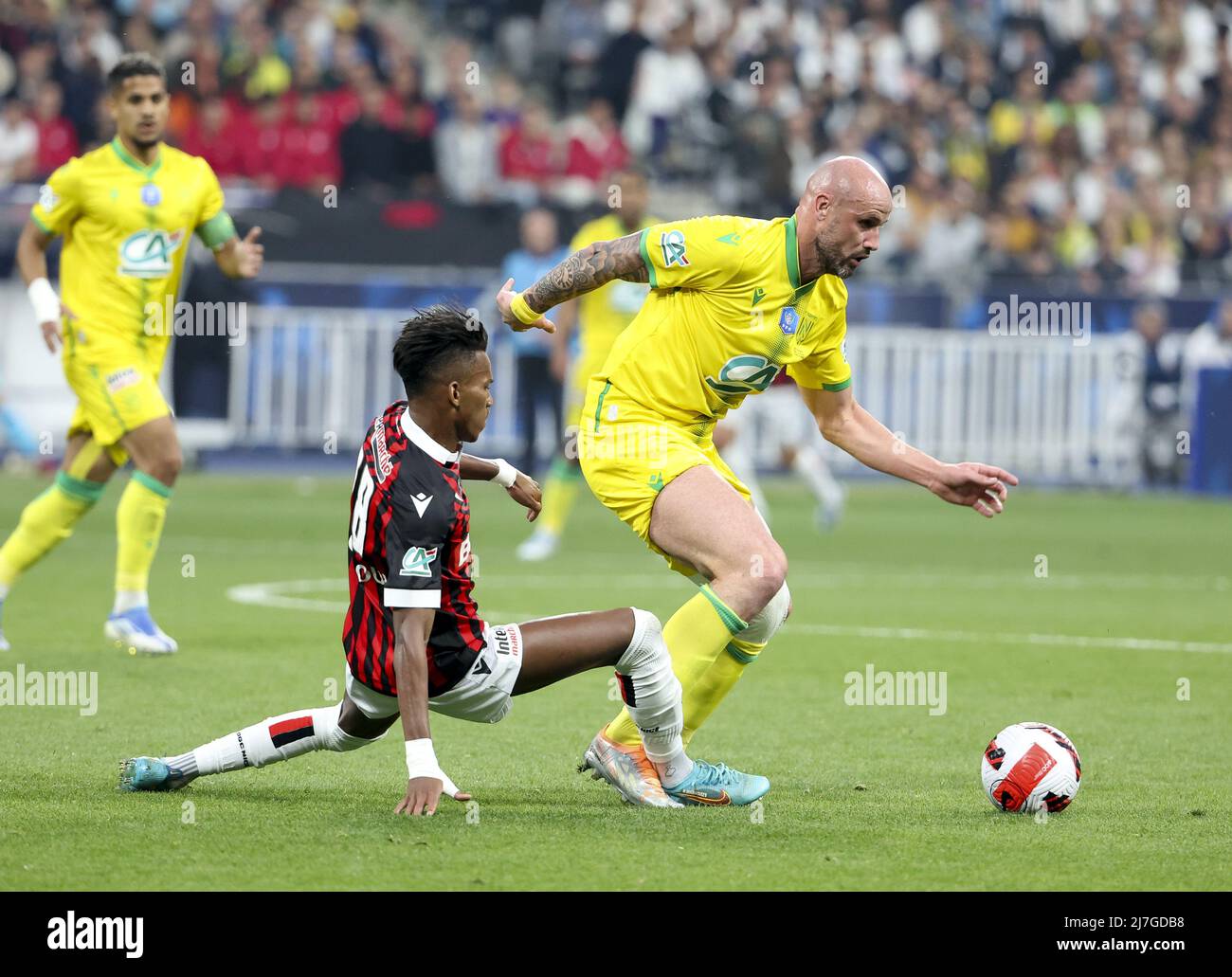 Nicolas Pallois of Nantes, Hicham Boudaoui of Nice (left) during the ...