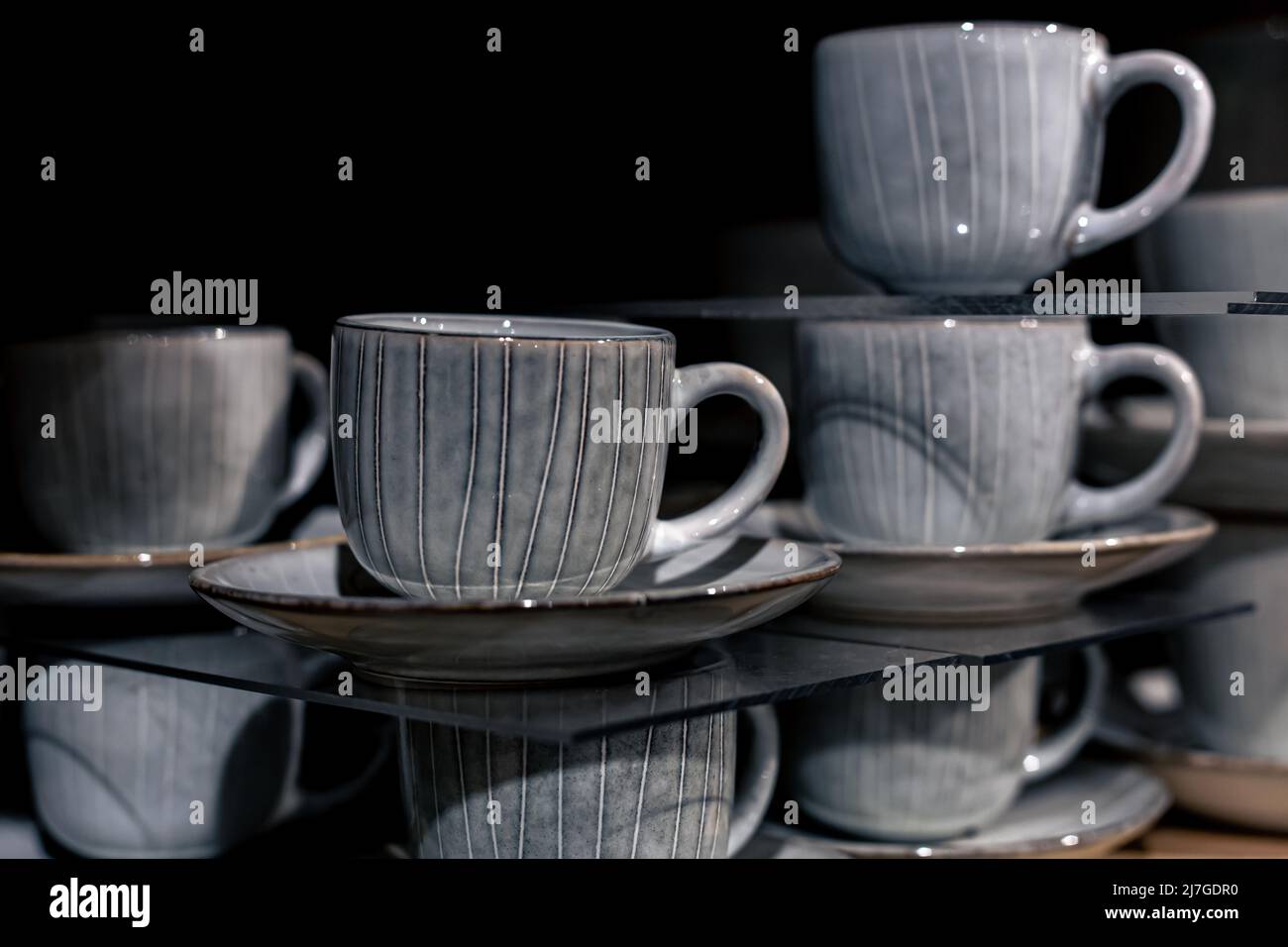 Close-up, beautiful grey ceramic cups with patterns Stock Photo - Alamy