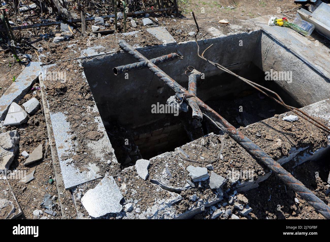Odessa, Ukraine. 06th May, 2022. The burnt cross lies on the ruined ...