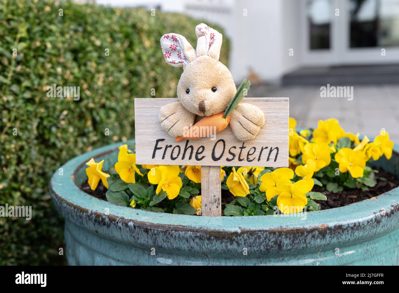 Sign with a rabbit and the inscription Happy Easter in German Stock ...