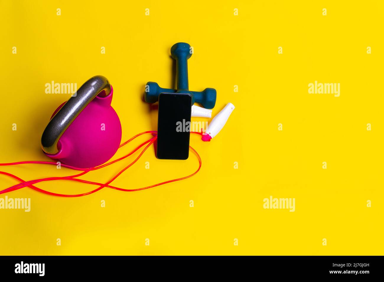 Kettlebell blue yellow jump space rope isolated background iron fit ...