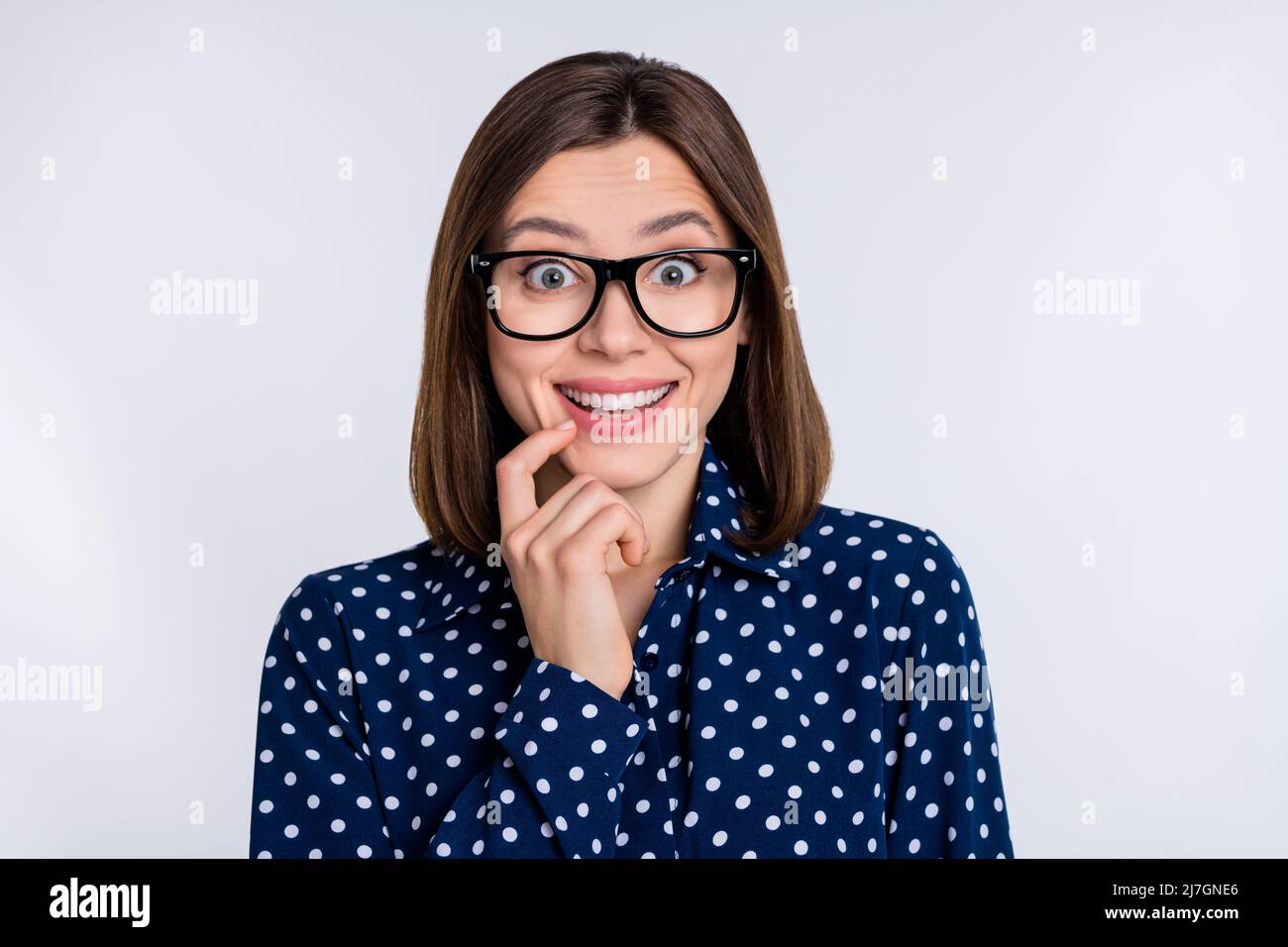 Photo of young cheerful lady good mood finger touch chin think idea ...