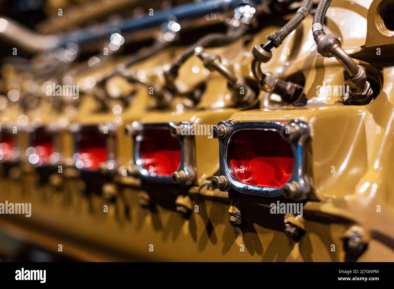Close-up of a detail of a rare car engine. Metal mechanisms. Automotive ...