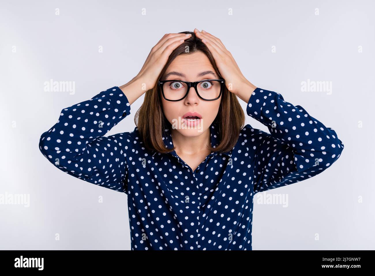 Photo of young impressed girl arms touch head problem project deadline ...