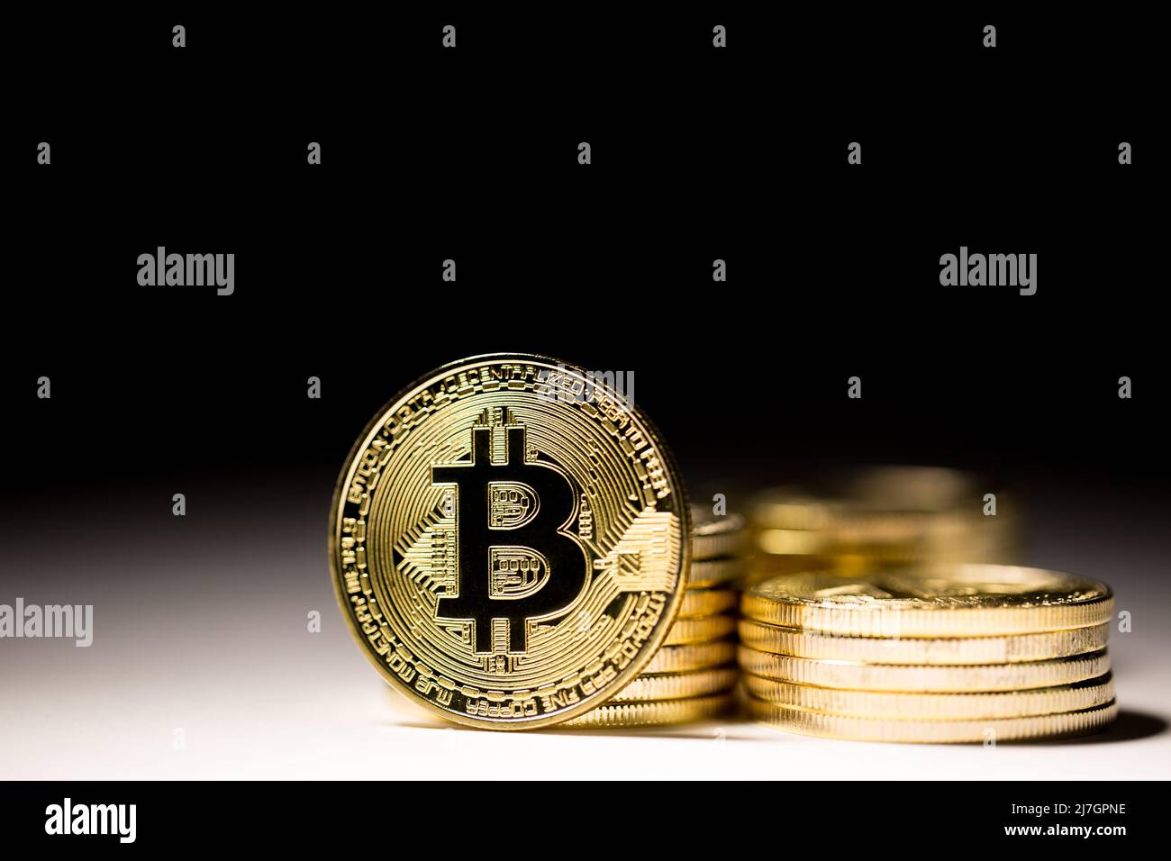 Bitcoin block chain crypto currency close up on a black to white gradient background Stock Photo ...