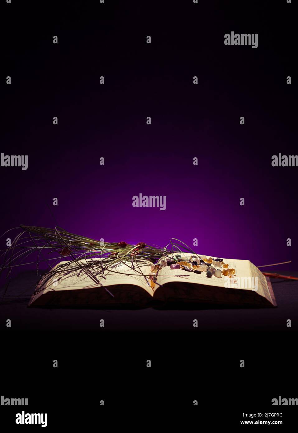 Purple magic book hi-res stock photography and images - Alamy